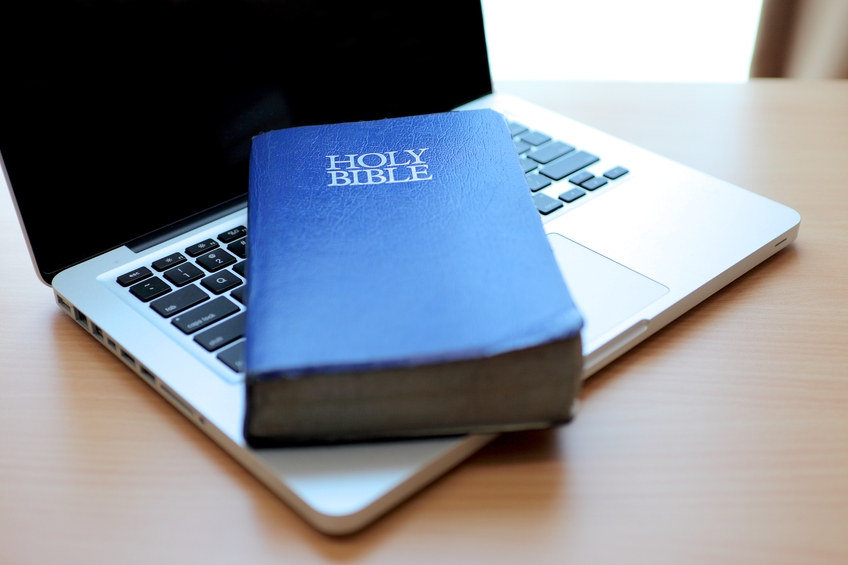 holy-bible-on-laptop-computer | CompareCamp.com